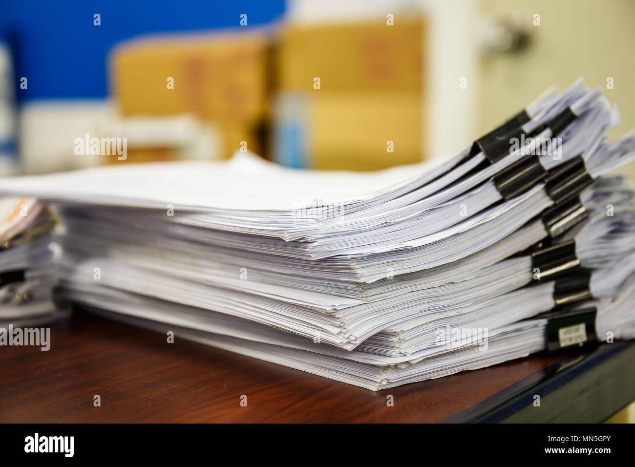 A pile of documents Desk Stock Photo - Alamy