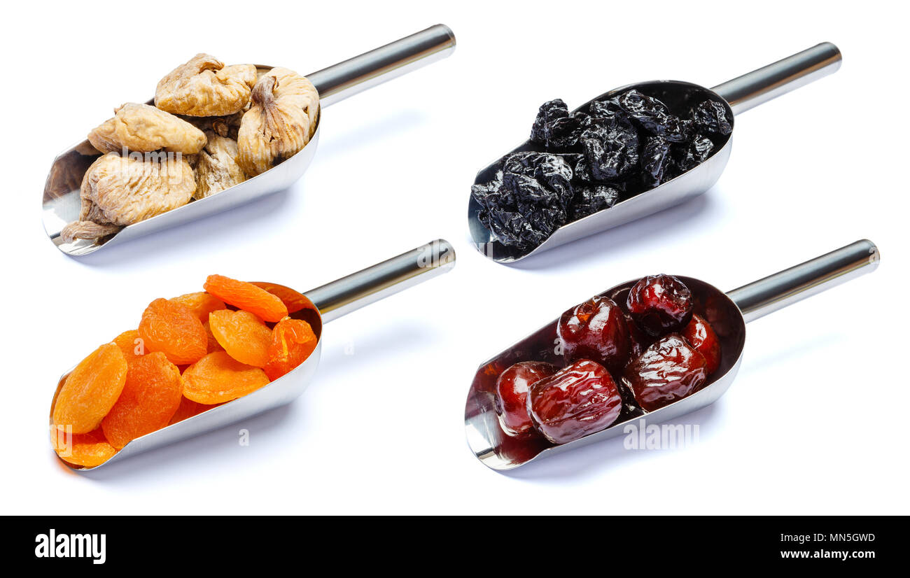Set of scoops full of dried fruits isolated on white Stock Photo - Alamy
