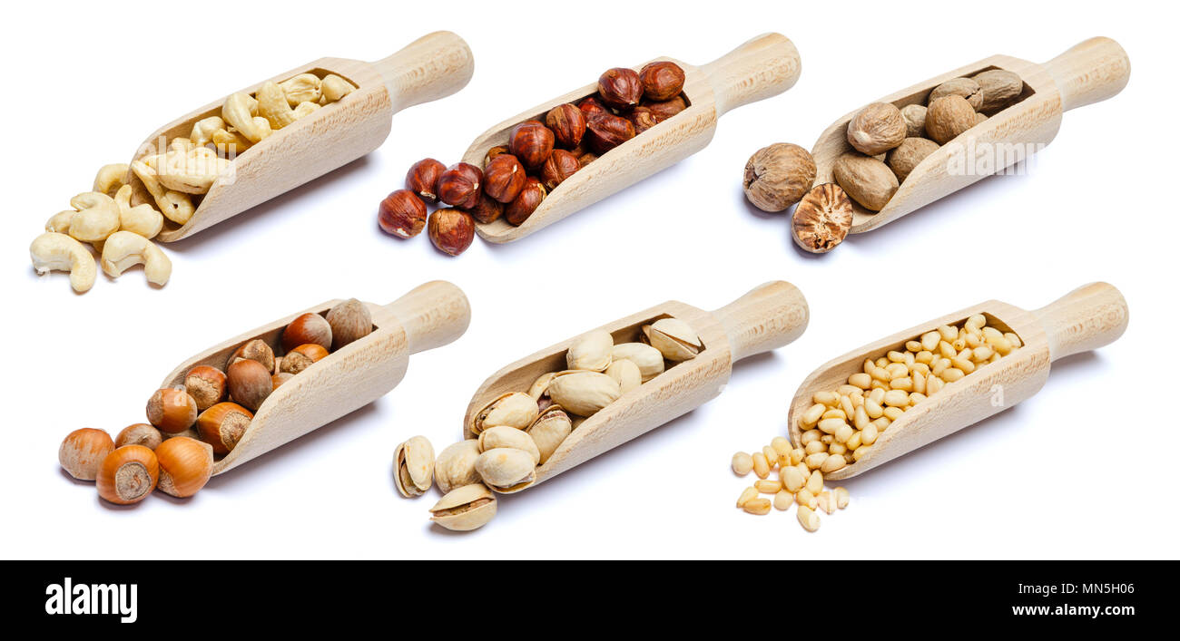 Set of Scoops full of nuts isolated on white Stock Photo - Alamy