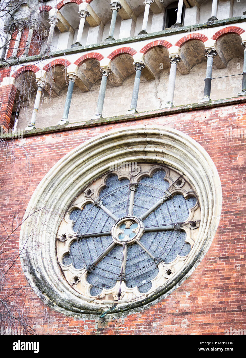 Round window of a church, vertical image Stock Photo - Alamy