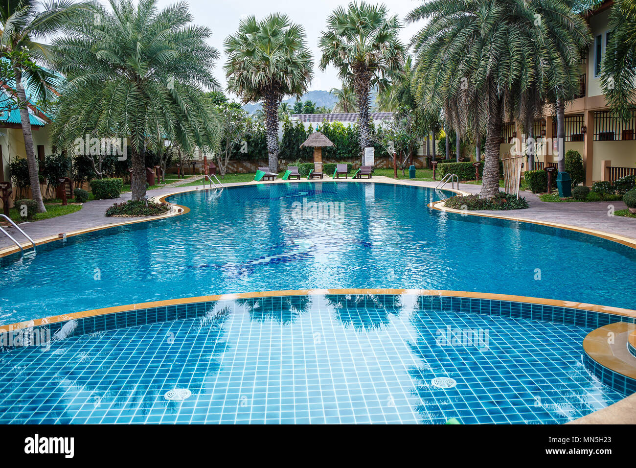 Residential inground swimming pool in backyard Stock Photo - Alamy