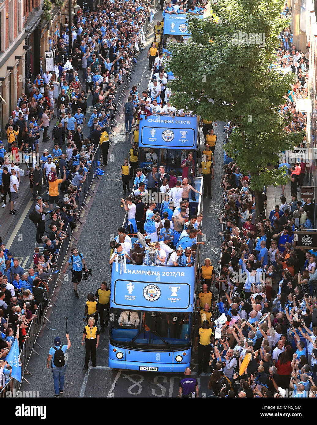 Manchester City players on a open-top bus during the Premier League ...