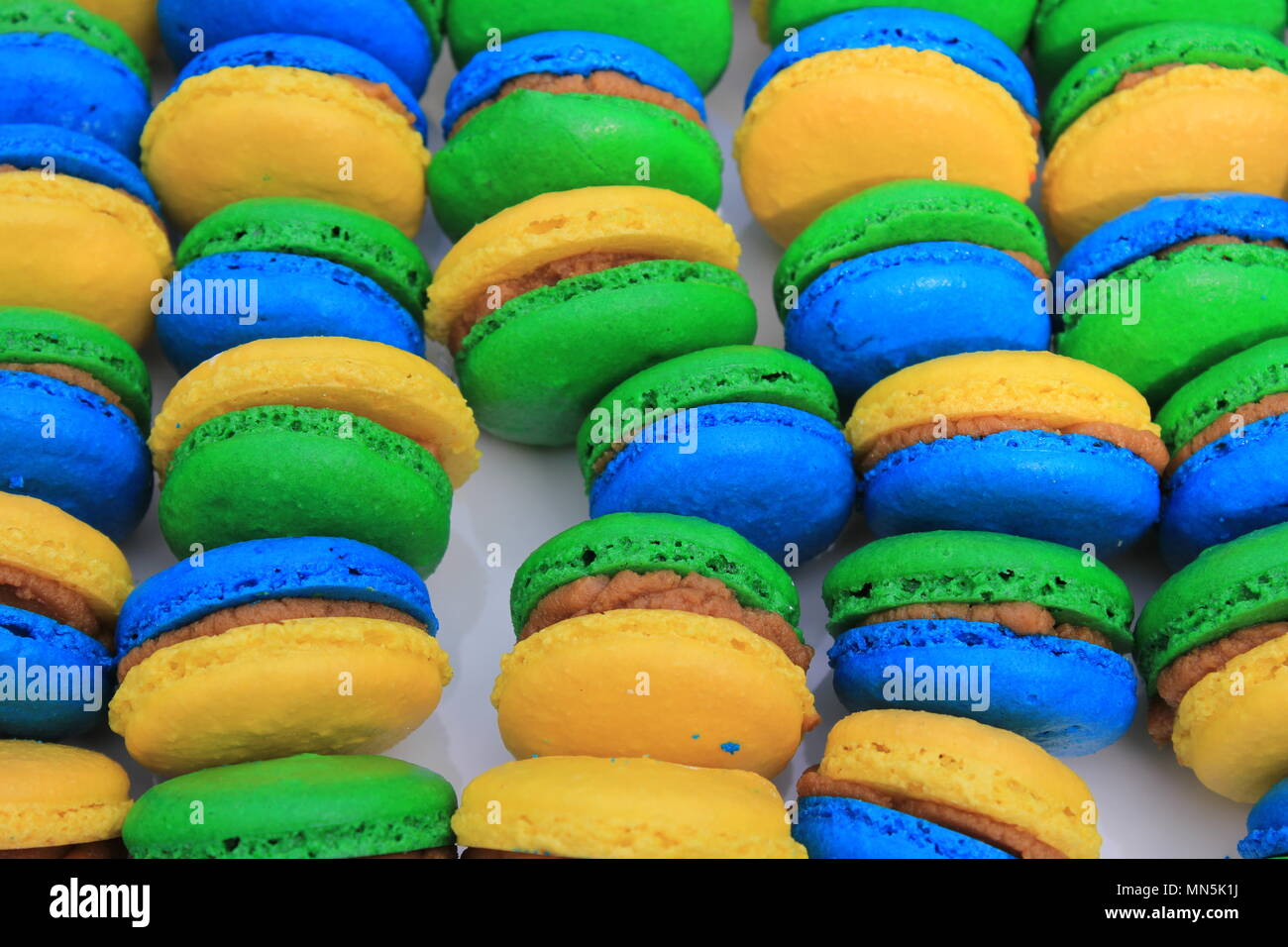 Delicious, colorful, and fresh homemade French macaron cookies served ...