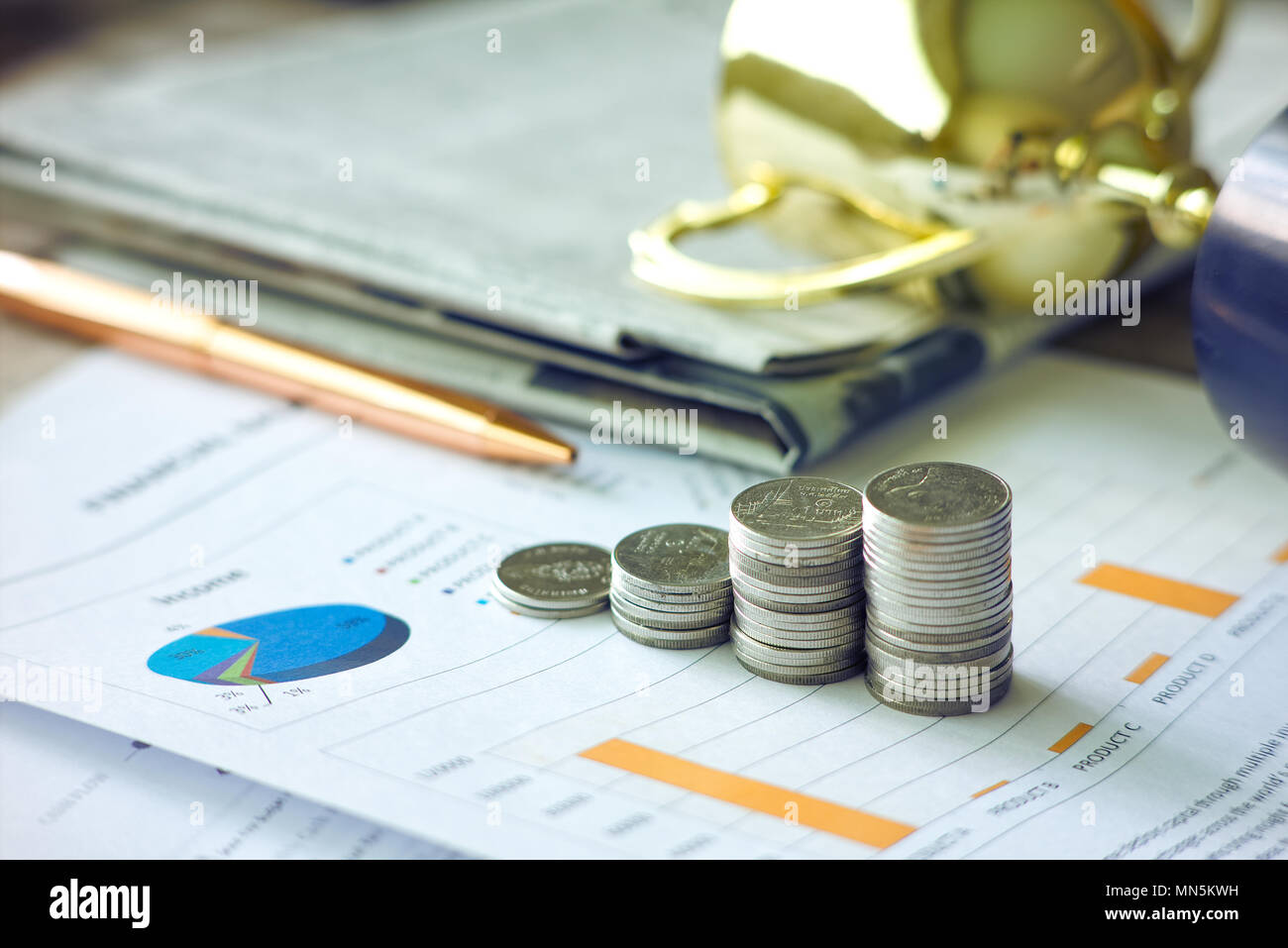 Stack of money on working desk of successful business man Stock Photo ...
