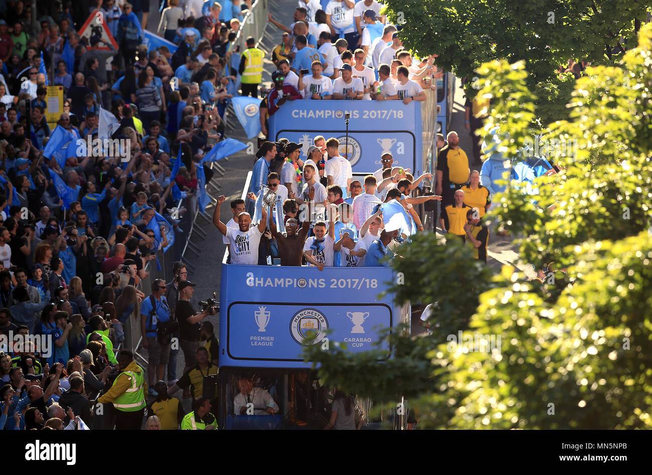 Manchester City players in a open-top bus during the Premier League ...