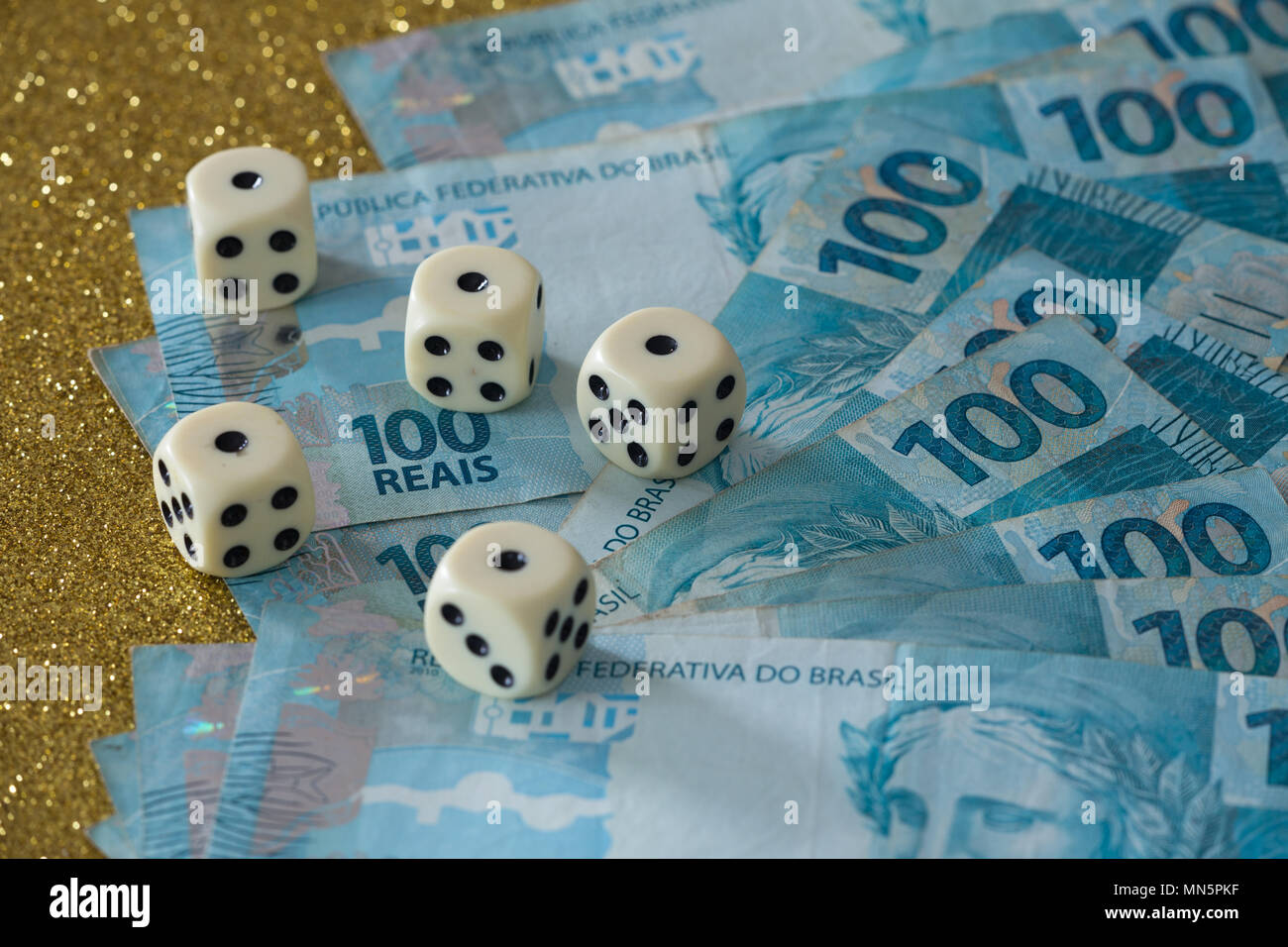 Brazilian money, reais and dice for the game / business concept Stock ...