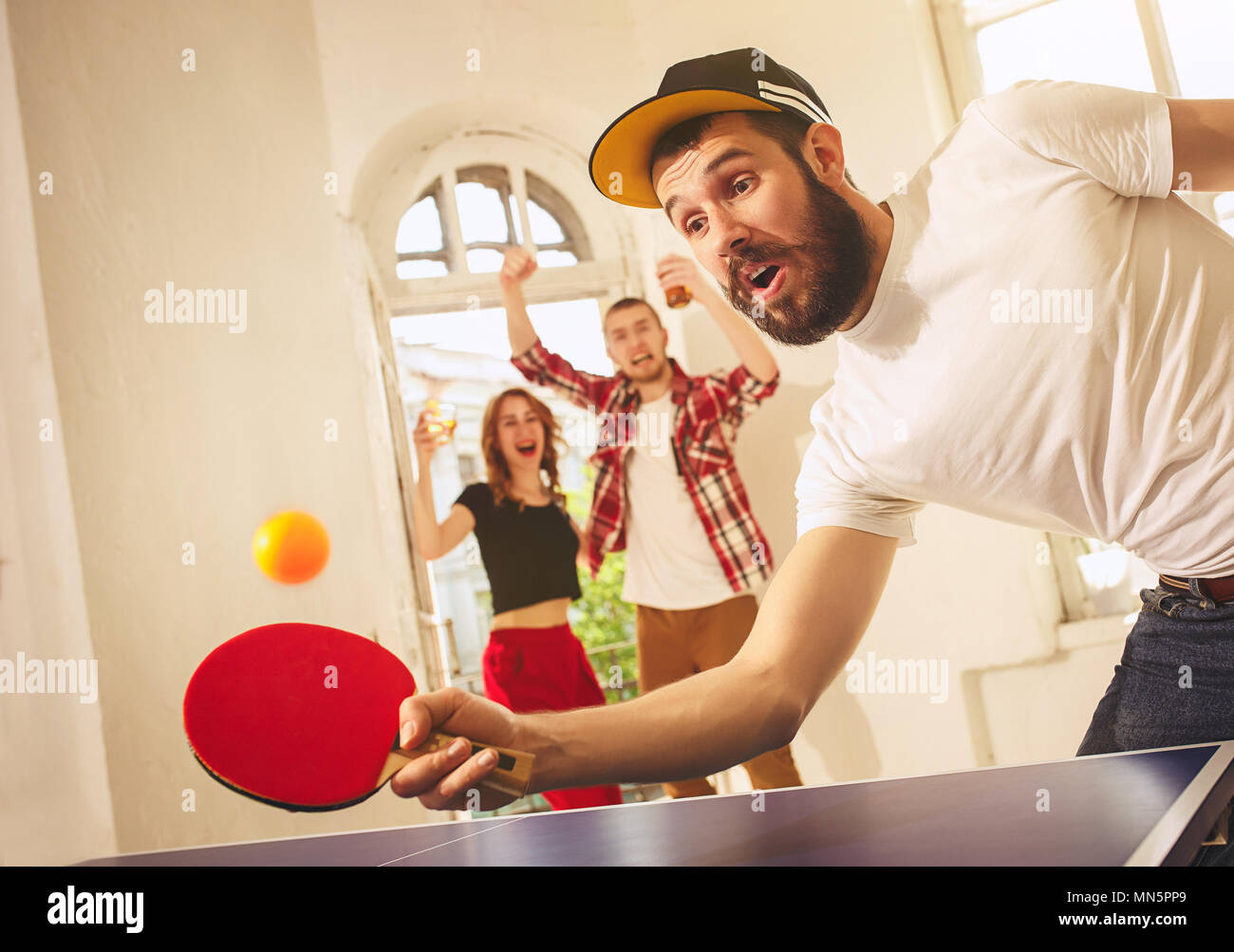 Cute girl playing table tennis hi-res stock photography and images - Alamy
