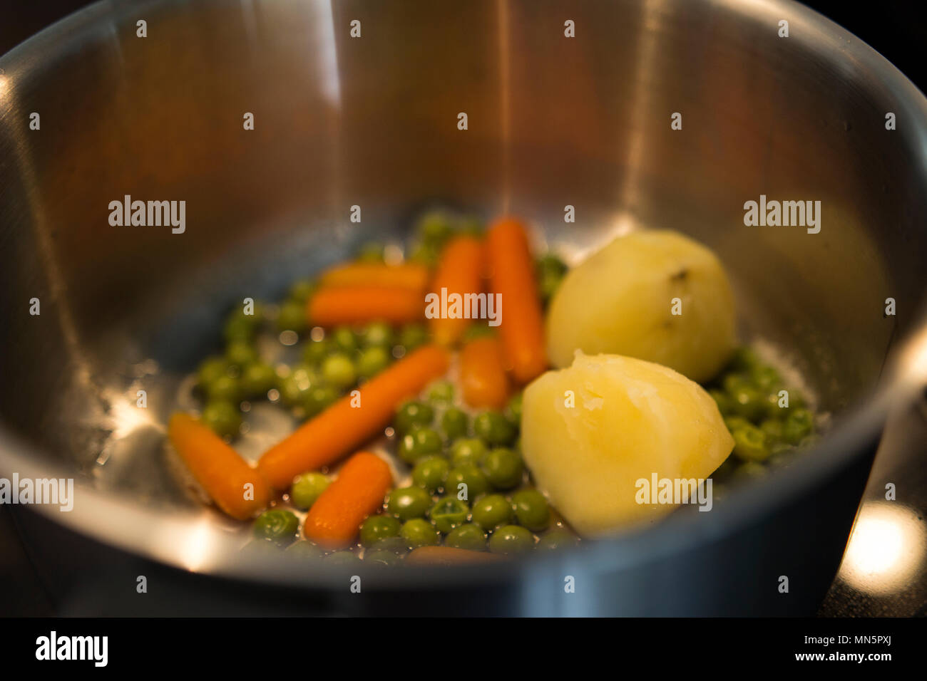 Making food in a kitchen Stock Photo - Alamy
