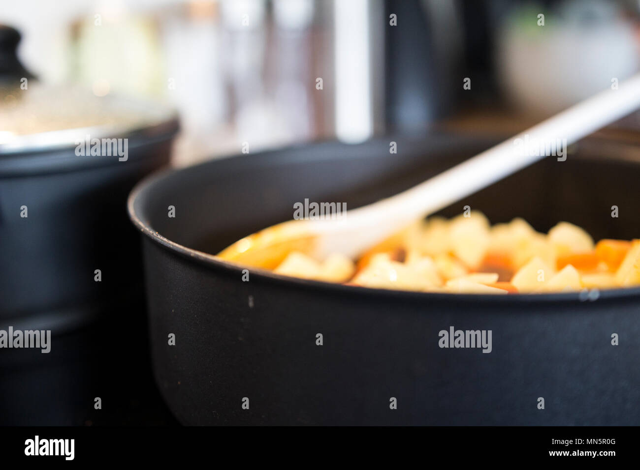 Making food in a kitchen Stock Photo - Alamy