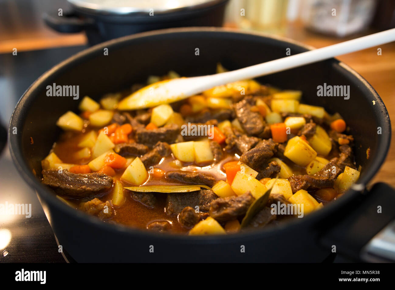 Making food in a kitchen Stock Photo - Alamy