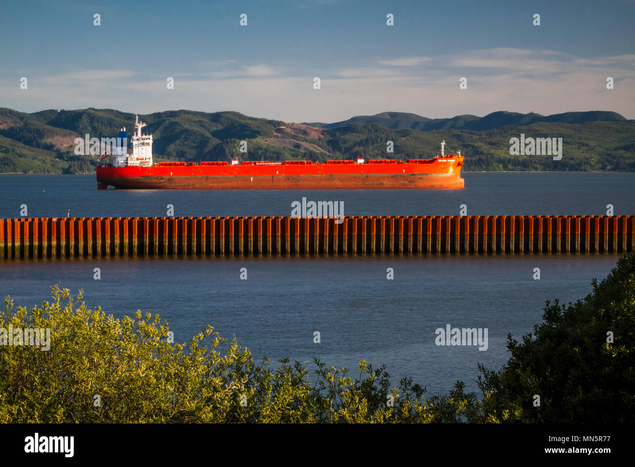 An ocean shipping vessel at anchor in the Columbia River near Astoria ...