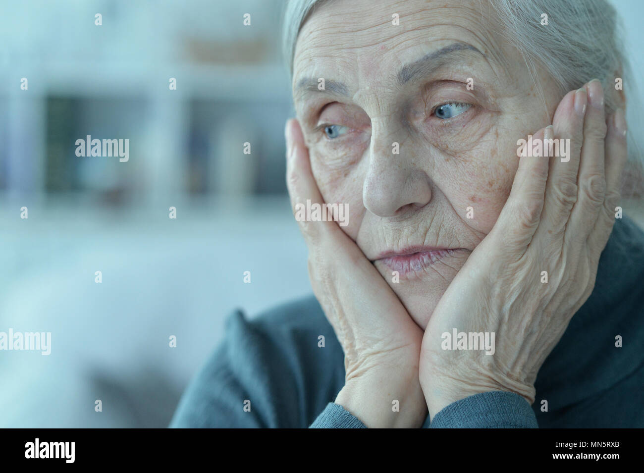 sad senior woman Stock Photo - Alamy