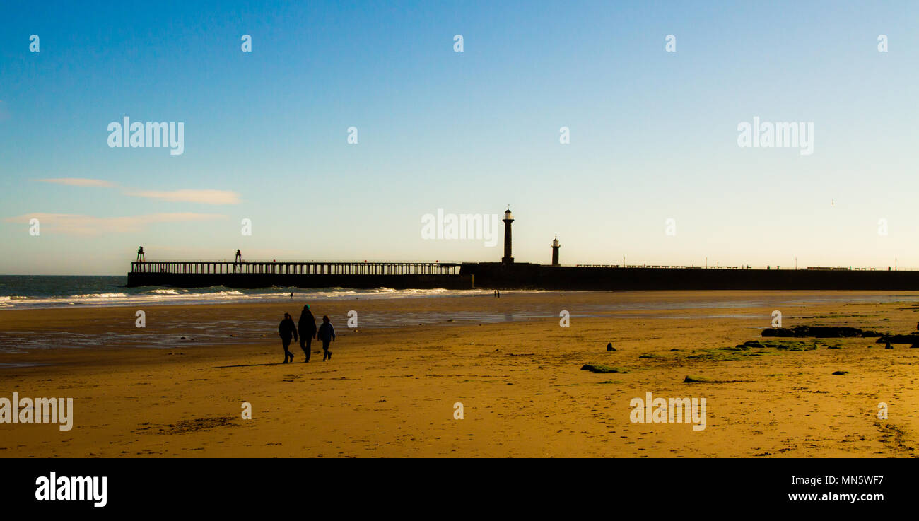 Whitby Beach Pier Family High Resolution Stock Photography and Images ...