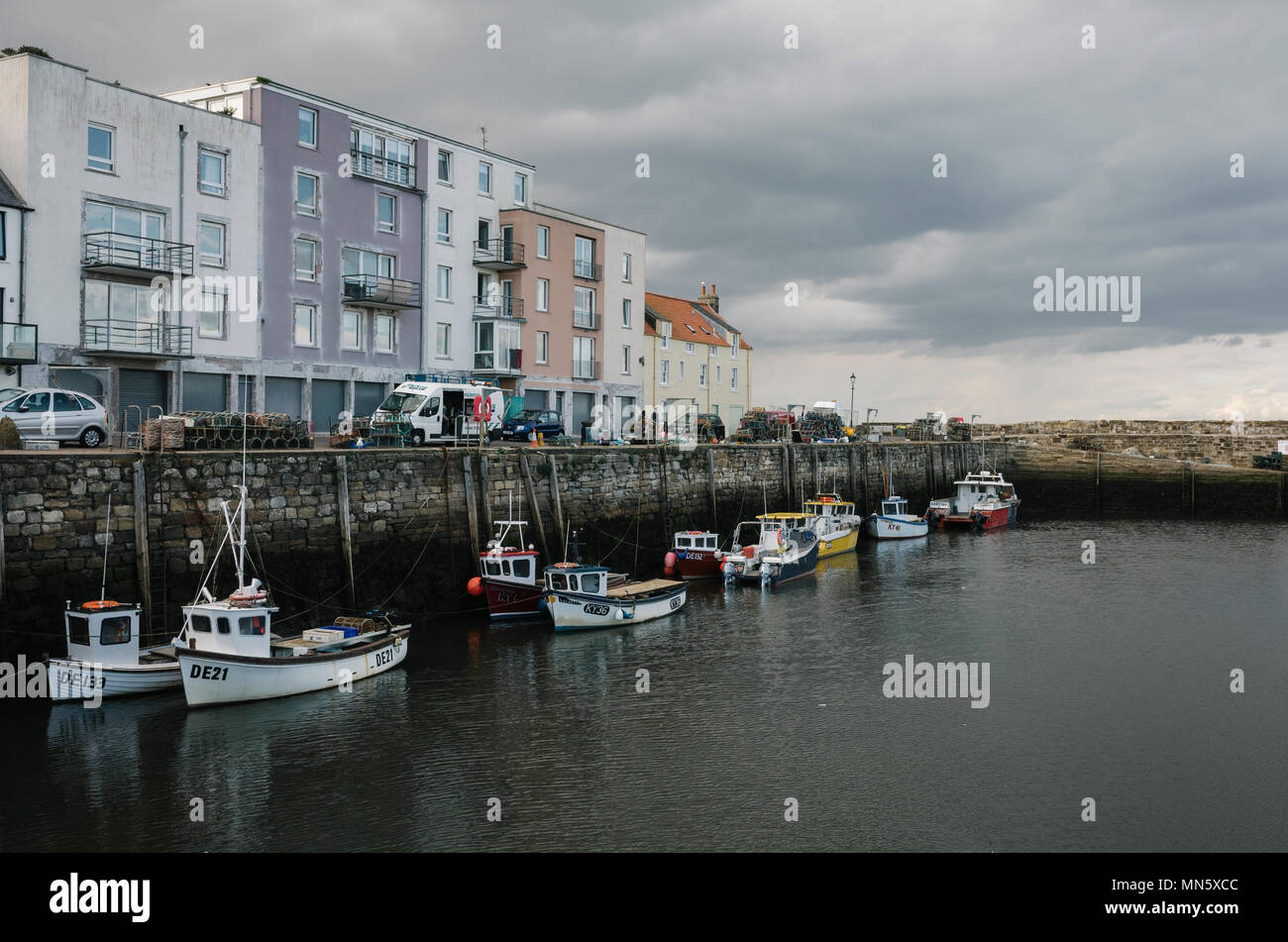 Lobster boats and creels in St. Andrews Harbour, Scotland Stock Photo ...