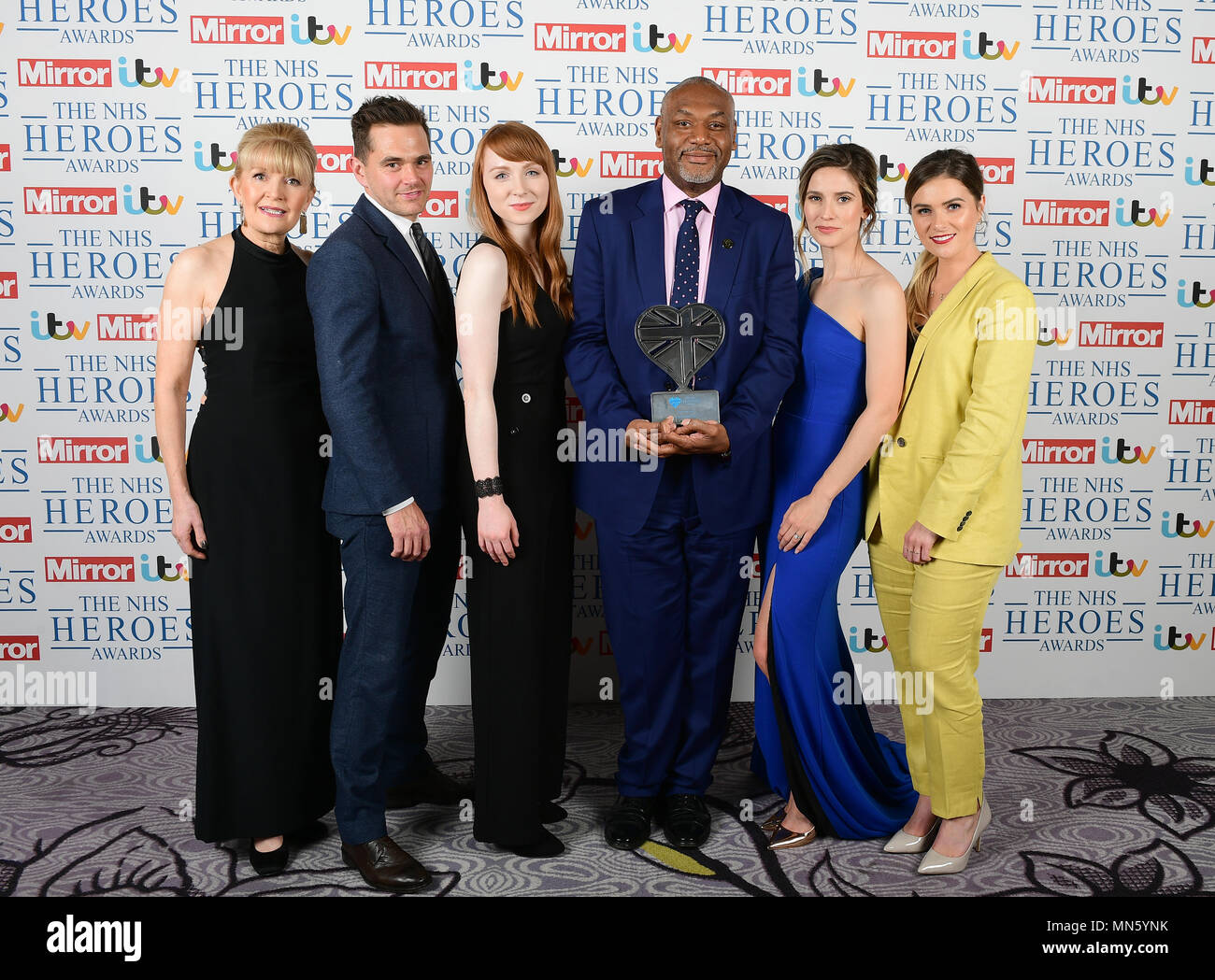 Martin Griffiths holds the Hero Doctor Award at the NHS Heroes Awards ...