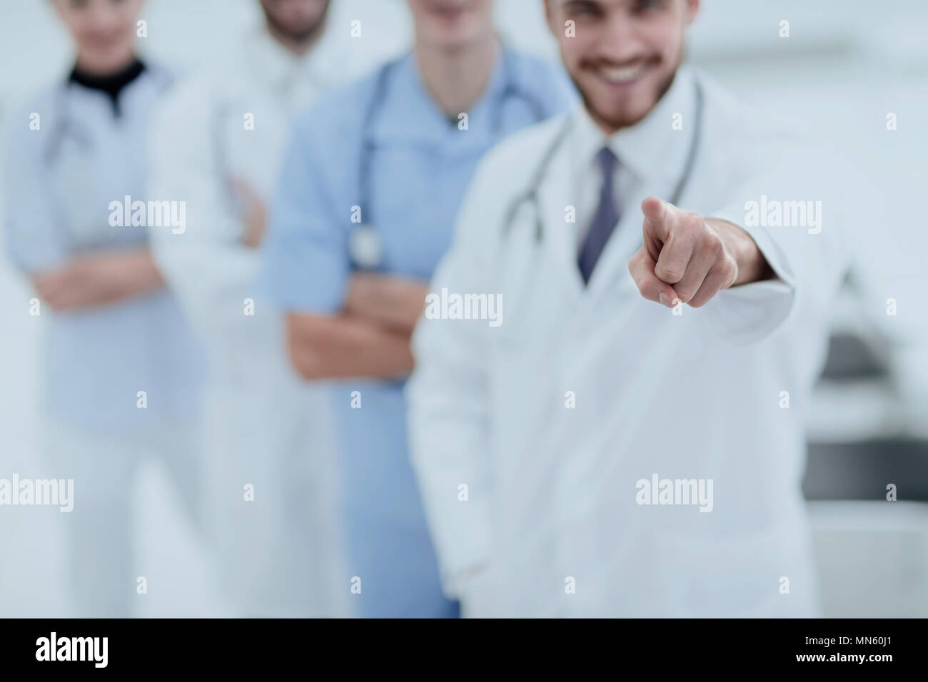 experienced doctor showing forward Stock Photo - Alamy