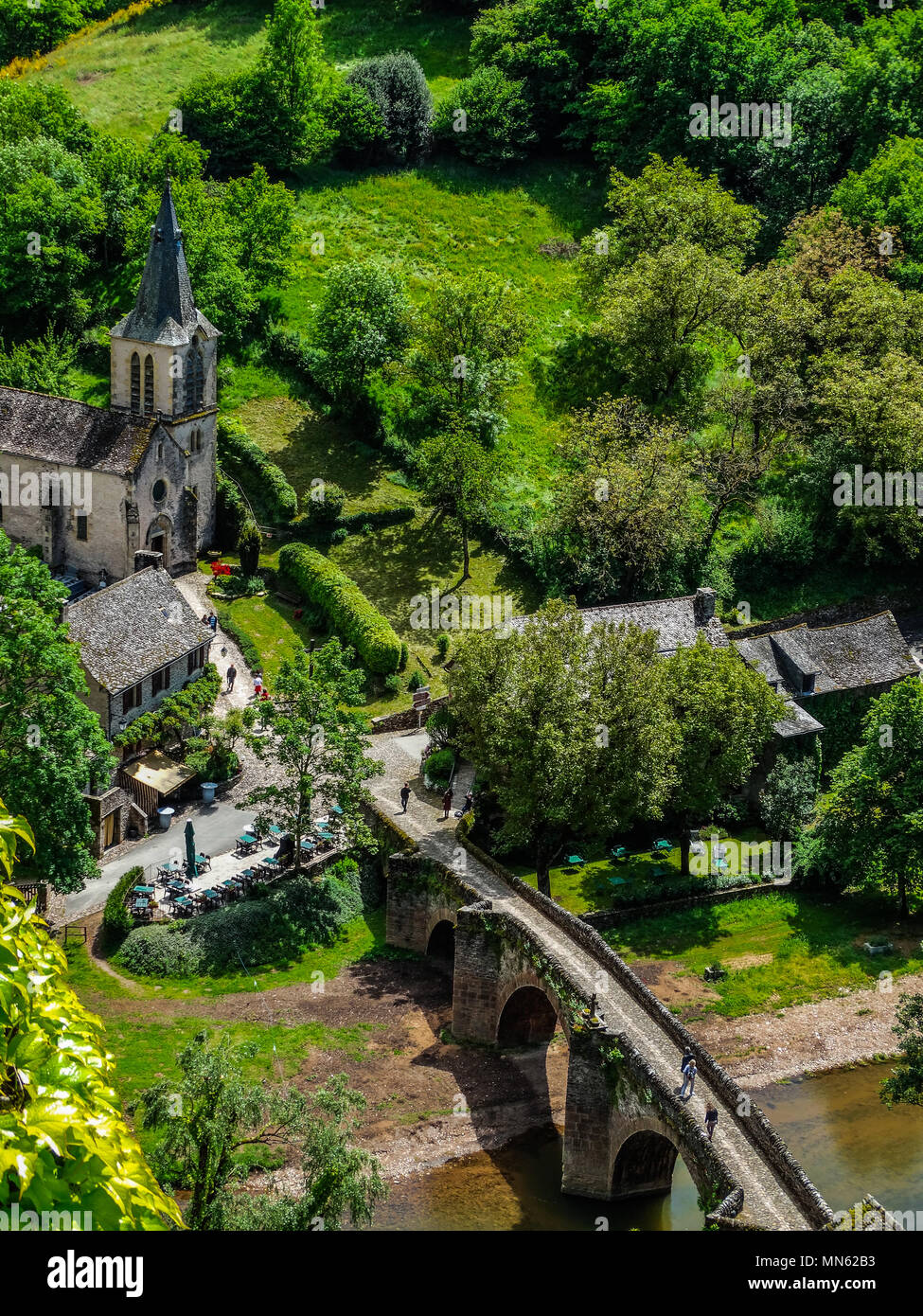 Belcastel aerial view of church and medieval bridge, France Stock Photo ...