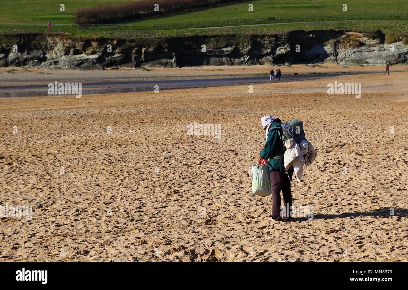 Newquay, Cornwall, UK - April 7 2018: Lone homeless woman or bag lady ...
