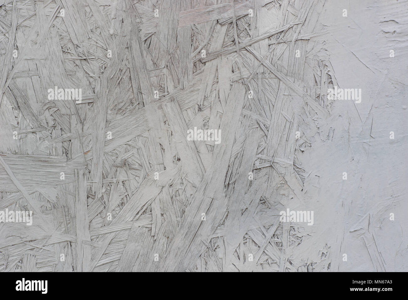 old weathered painted wooden oriented strand board (OSB) background ...