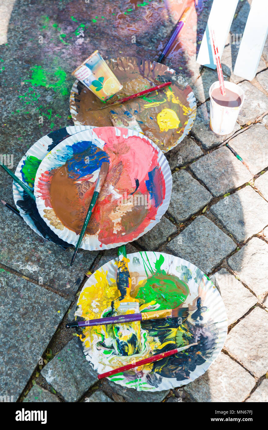 Acrylic colours on plate with paining brushes for art work. Colours ...