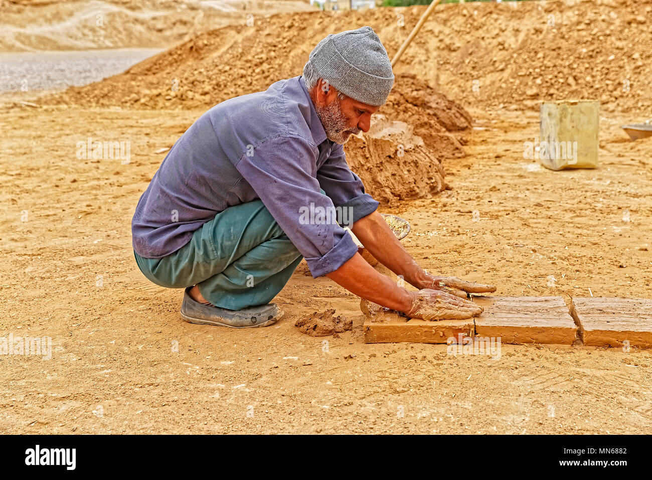 Man making bricks hi-res stock photography and images - Alamy