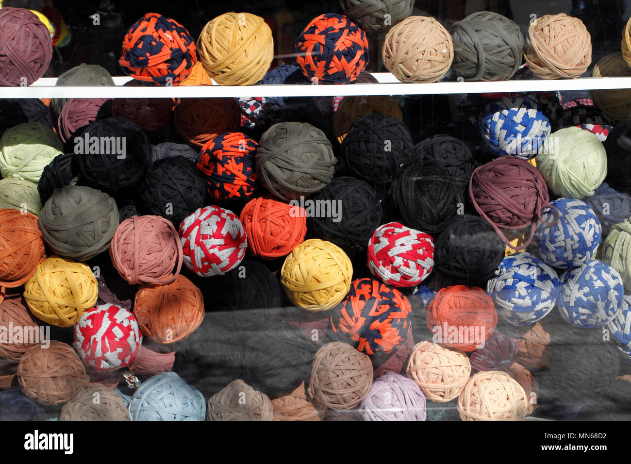 balls of wool in a shop window Stock Photo - Alamy