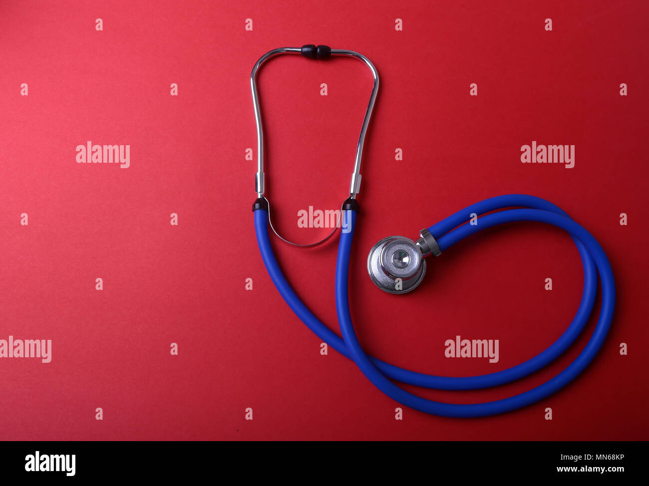 Red color stethoscope hi-res stock photography and images - Alamy