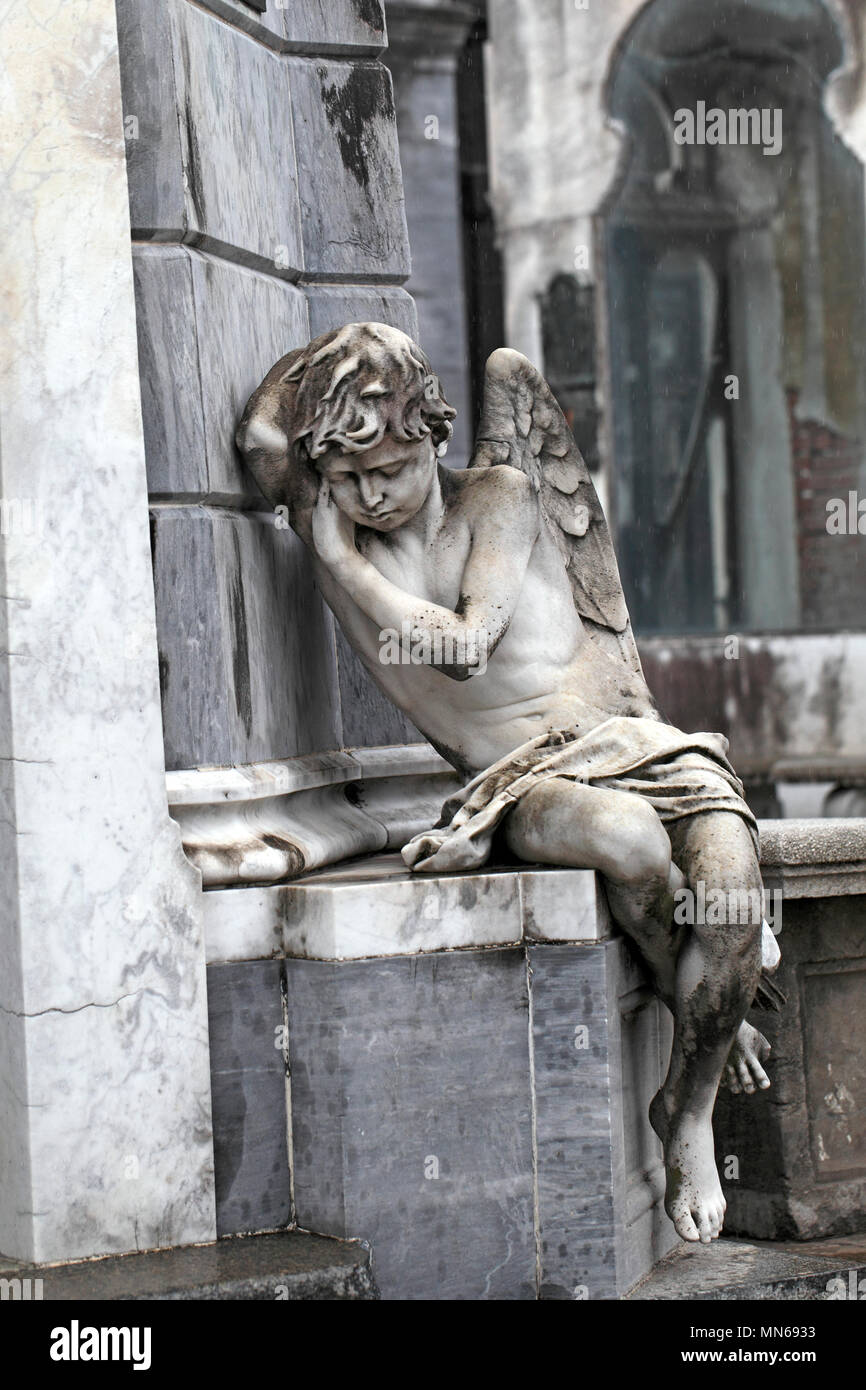 statue of a sleeping boy angel at La Recoleta cemetery Buenos Aires ...
