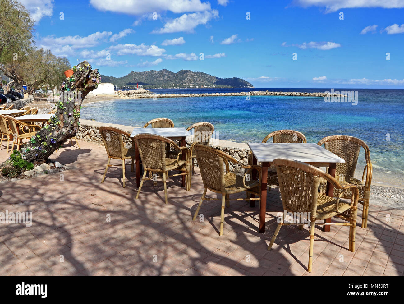 Rattan chairs and tables outside bar, Cala Millor, Mallorca Stock Photo ...