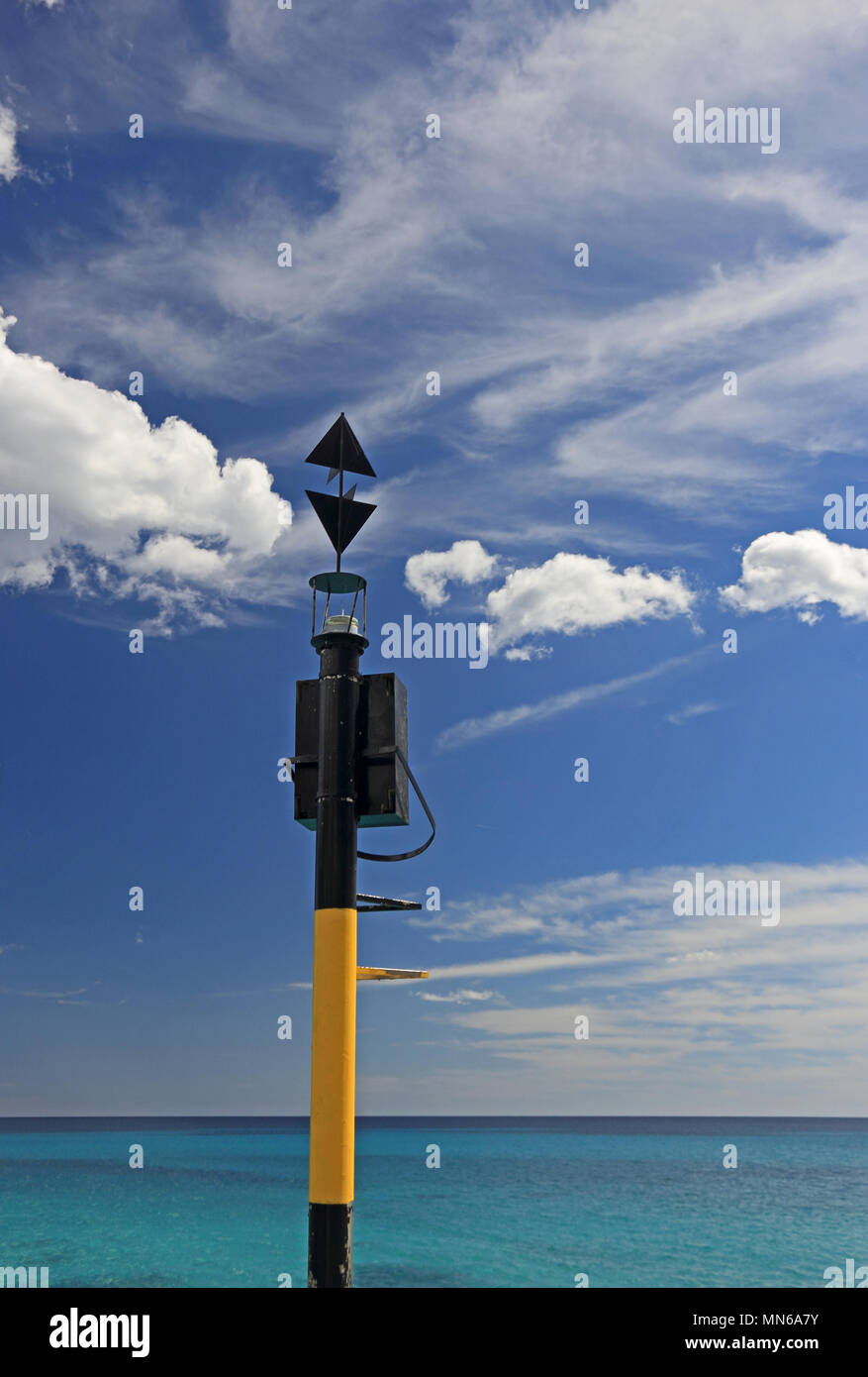 East cardinal mark on end of jetty, Cala Millor, Mallorca Stock Photo ...