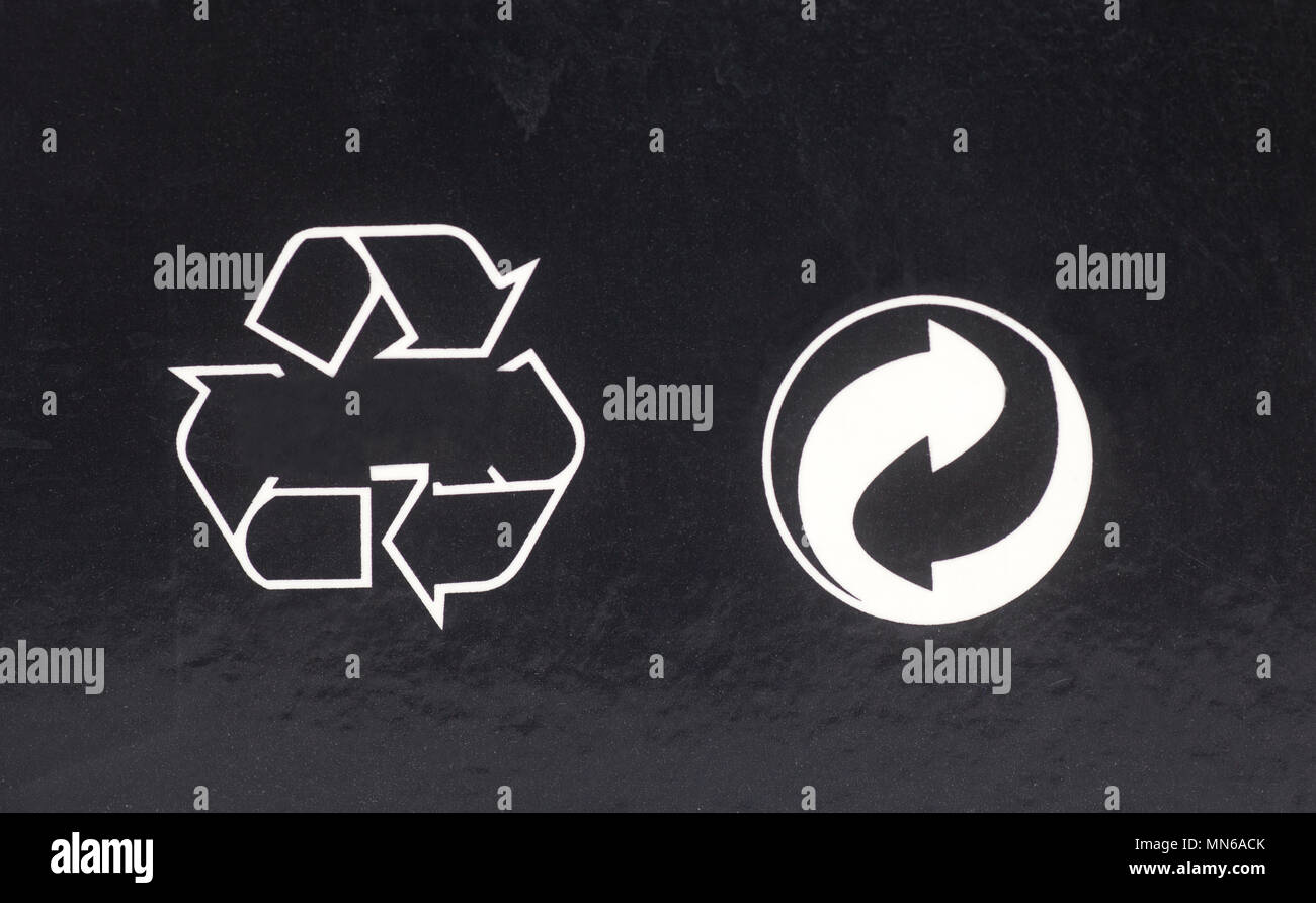 Recycle icon symbol on a black background Stock Photo - Alamy