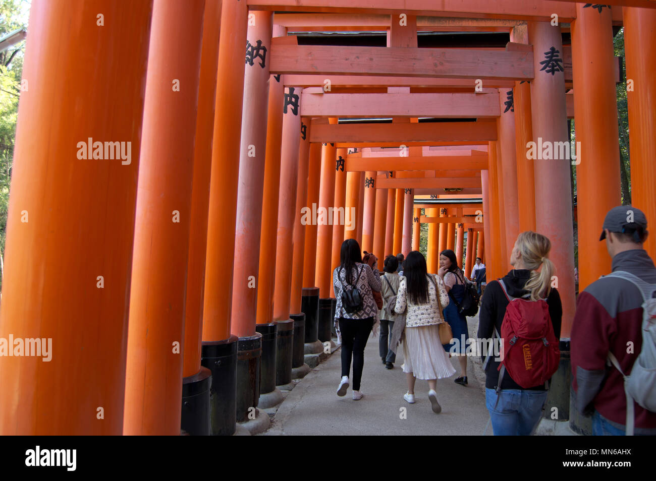 Tourists beginning the walk at the Fushimi Inari shrine in Kyoto, Japan ...