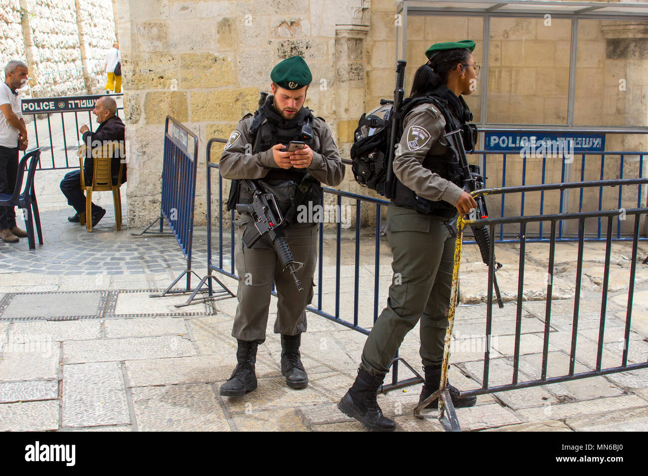 12 May 2018 Young Israeli policeman and woman on duty in the Via ...