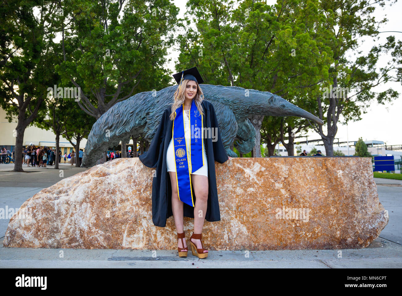 Graduate student from University of Irvine UCI next to statue mascot of ...