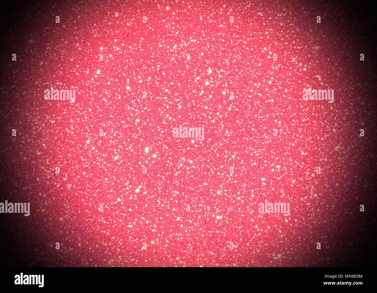 red background with glittering and vignetting effect ideal for writing ...