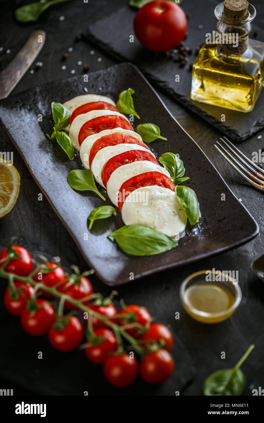 Caprese ingredients black background hi-res stock photography and ...