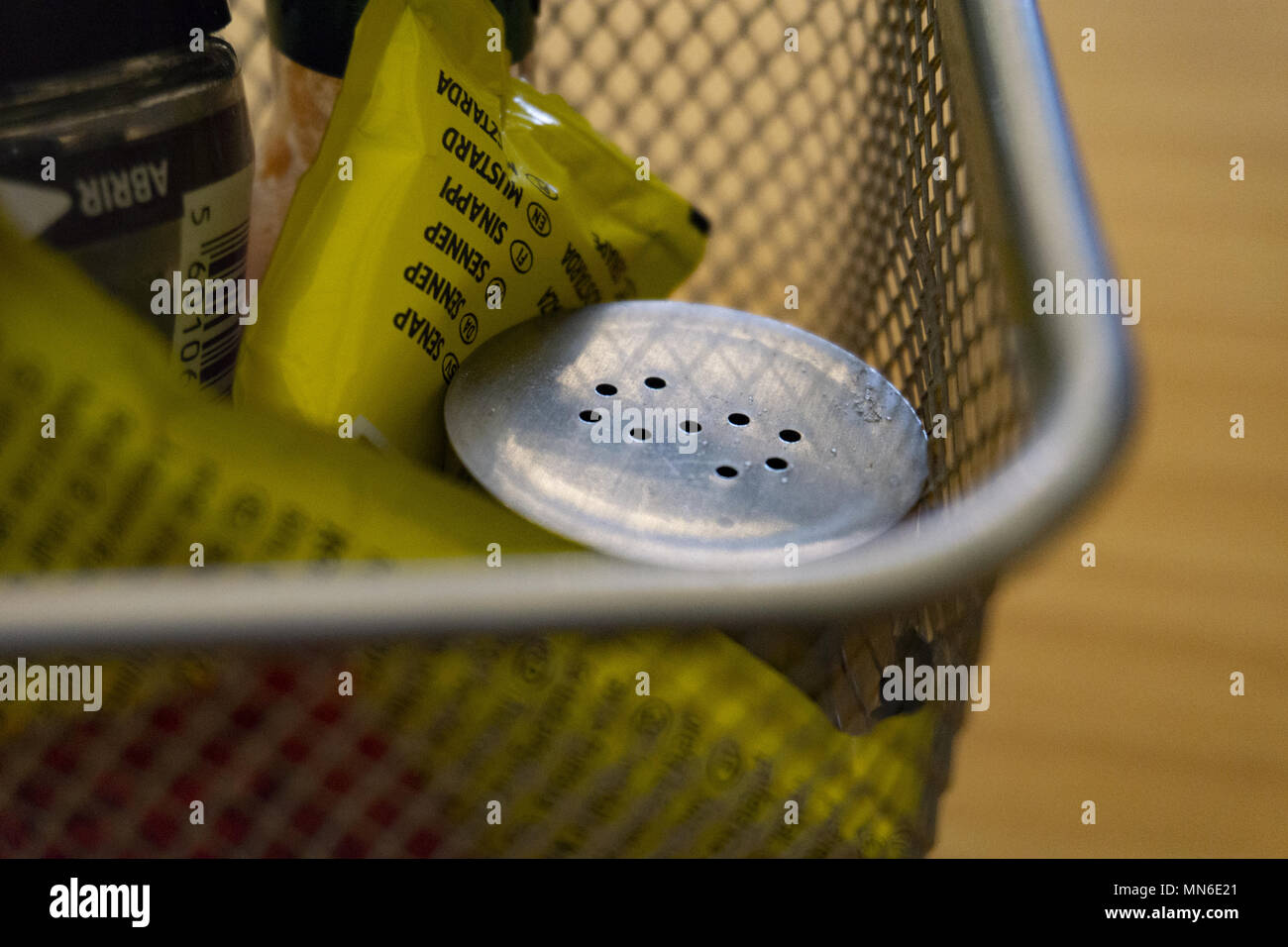 Metal salt cellar in fast food mayonnaise Stock Photo - Alamy