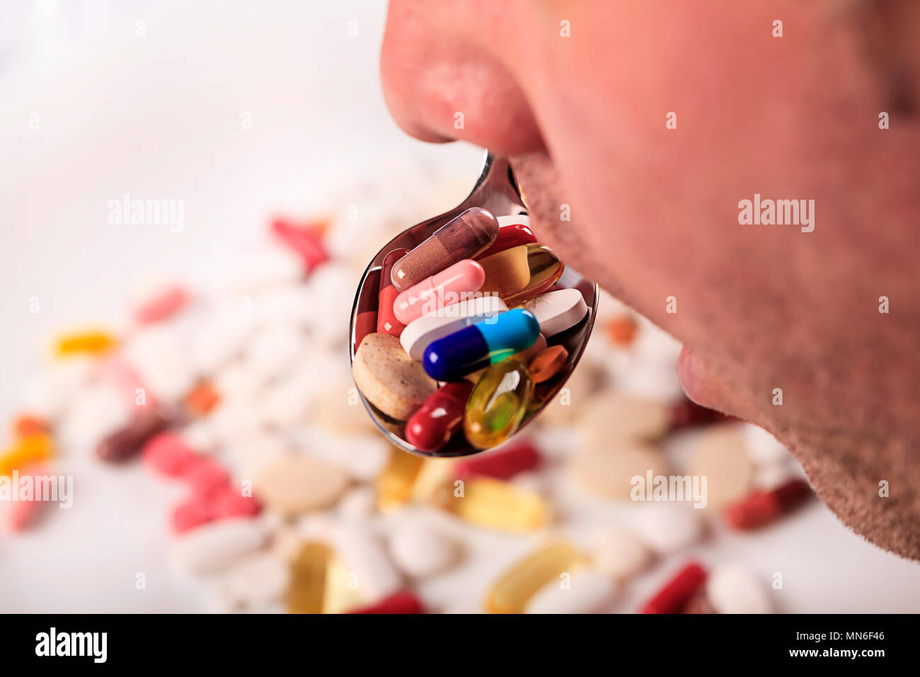 Hand spoon lips hi-res stock photography and images - Alamy