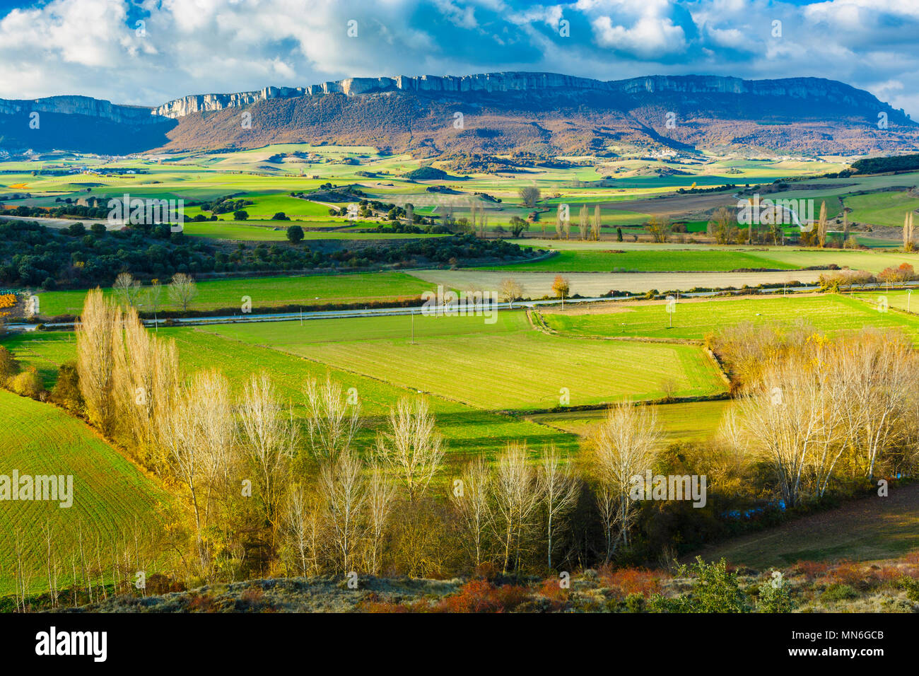 Mountain range and agriculture lands Stock Photo - Alamy