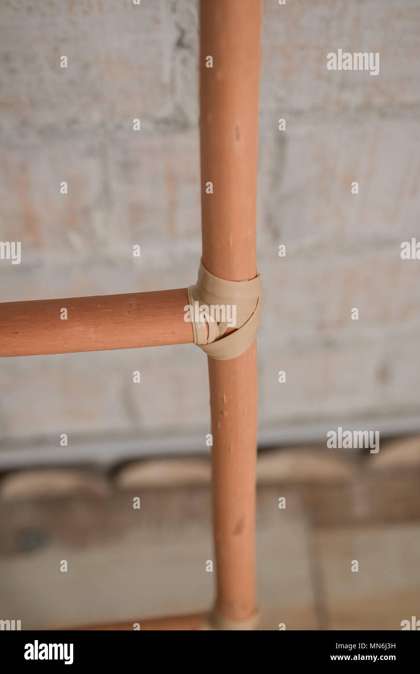 Ladder for clothes in a loft style of wood Stock Photo - Alamy