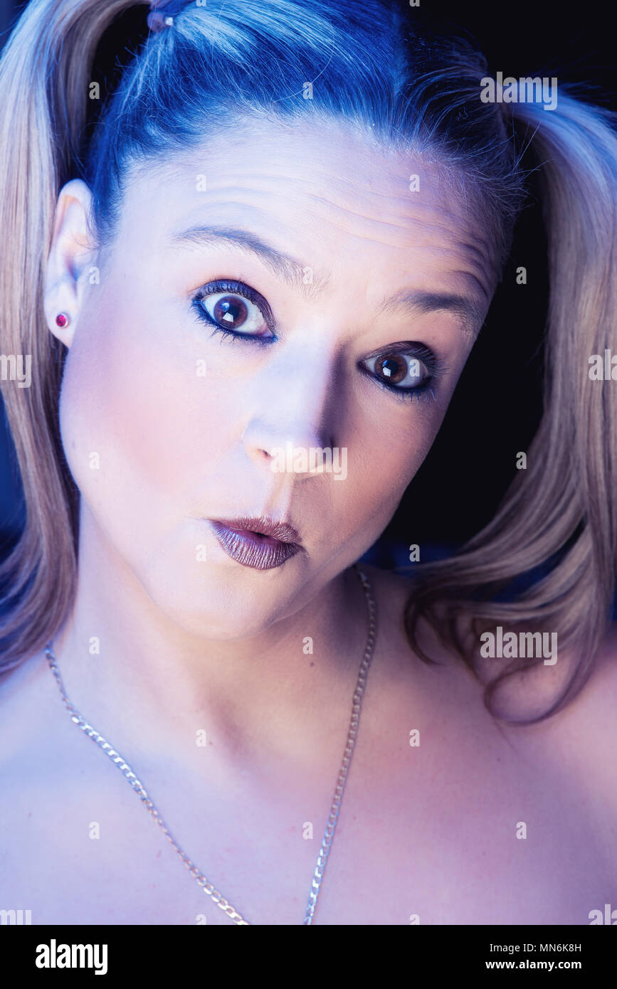 Studio portrait woman shocked expression hi-res stock photography and ...
