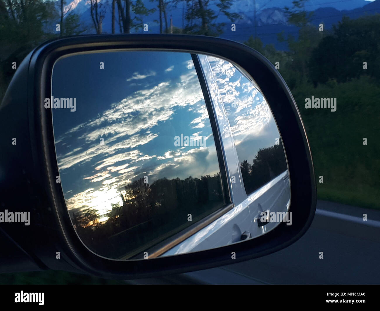 Street and clouds hi-res stock photography and images - Alamy