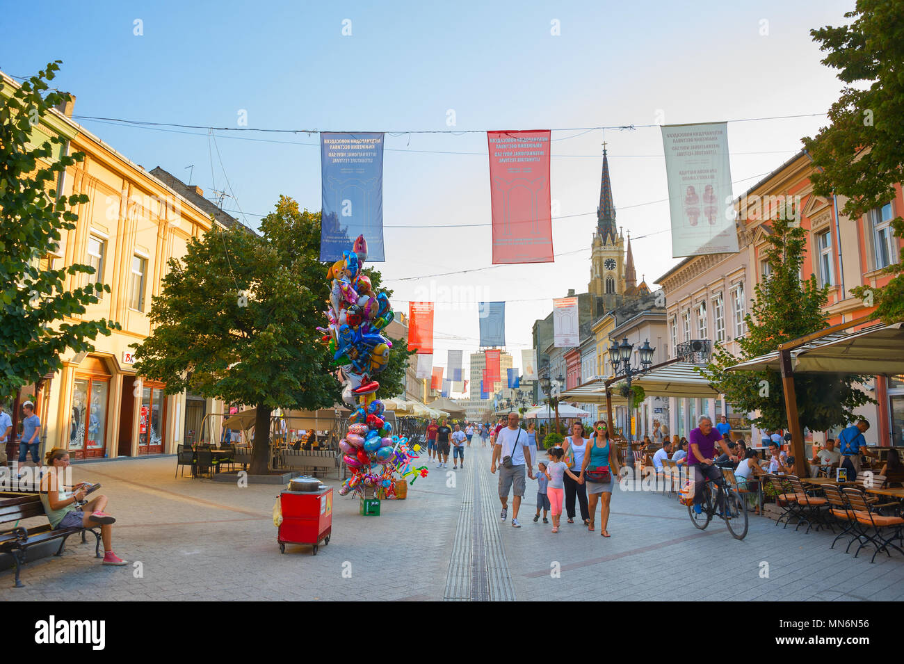 NOVI SAD, SERBIA - AUGUST 26, 2017: People walk at the Old Town street ...