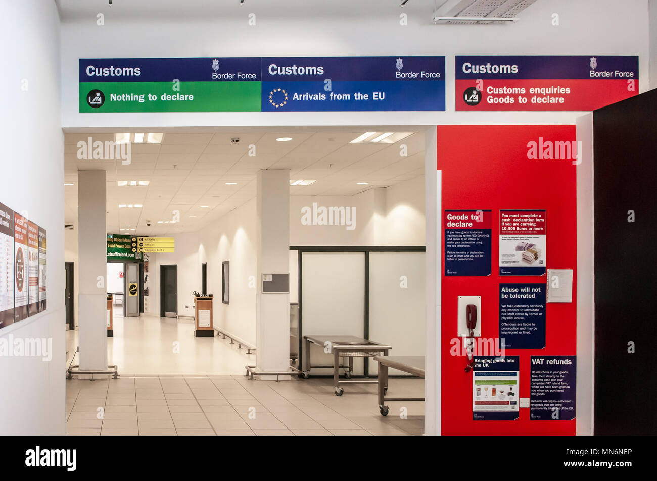 Green, blue and red customs channel at a UK airport Stock Photo - Alamy