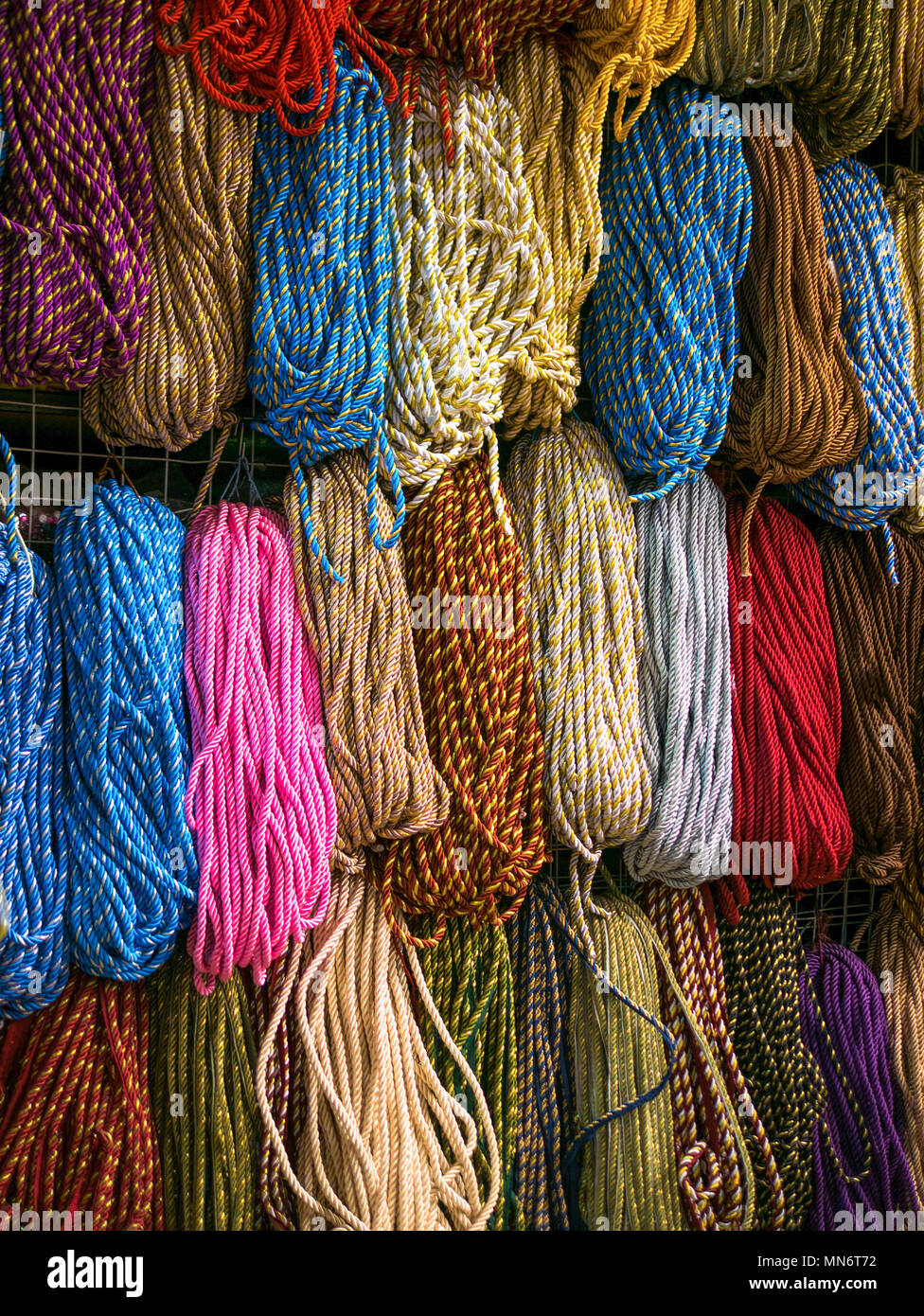 Coil of color rope. Close up of part of color rope wrapped around Stock ...