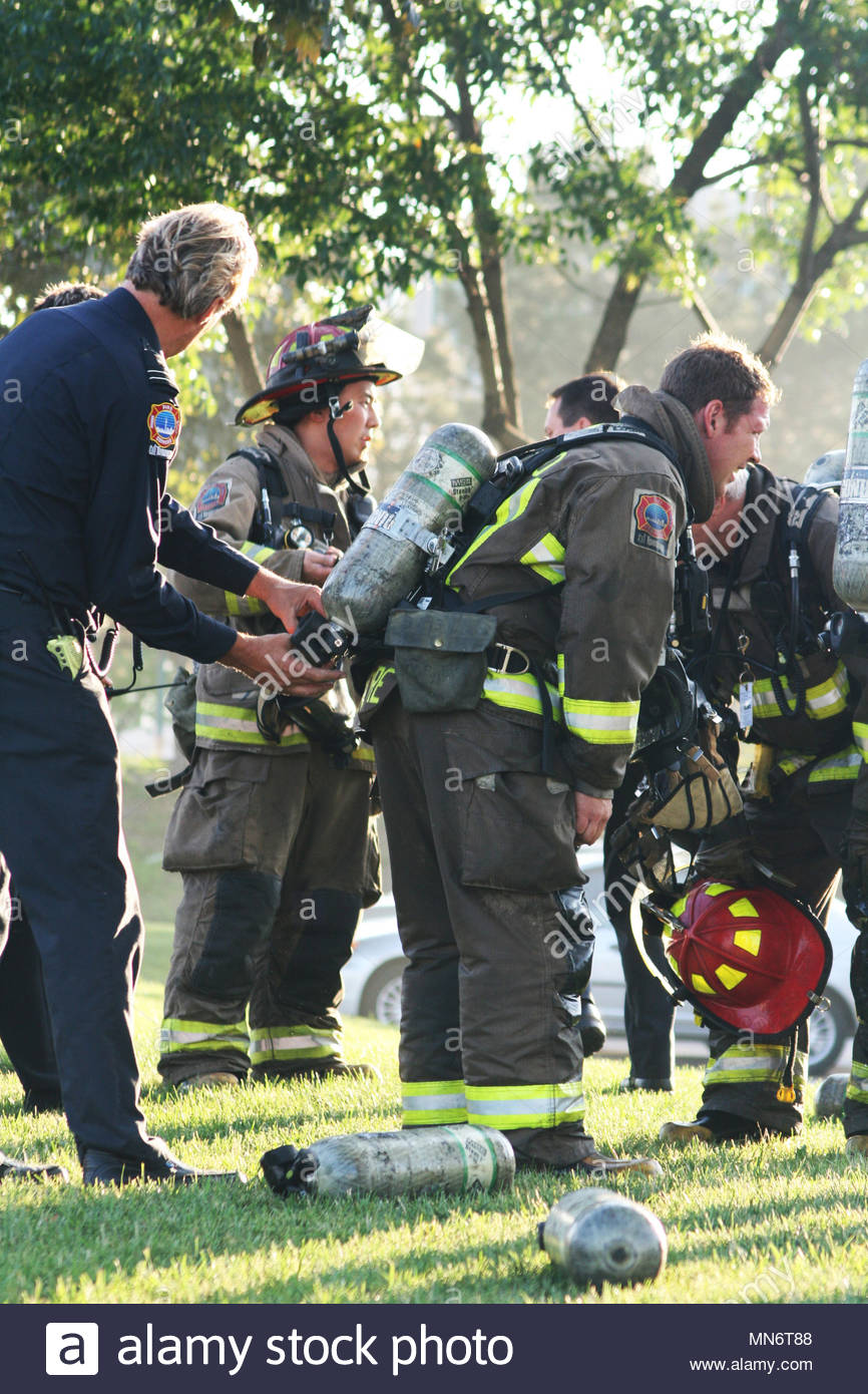 Firefighters With Oxygen Tanks High Resolution Stock Photography and ...