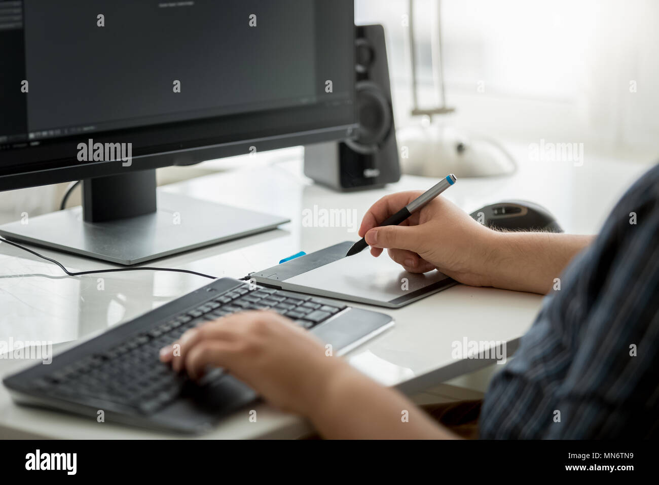 Business man behind monitor using hi-res stock photography and images ...