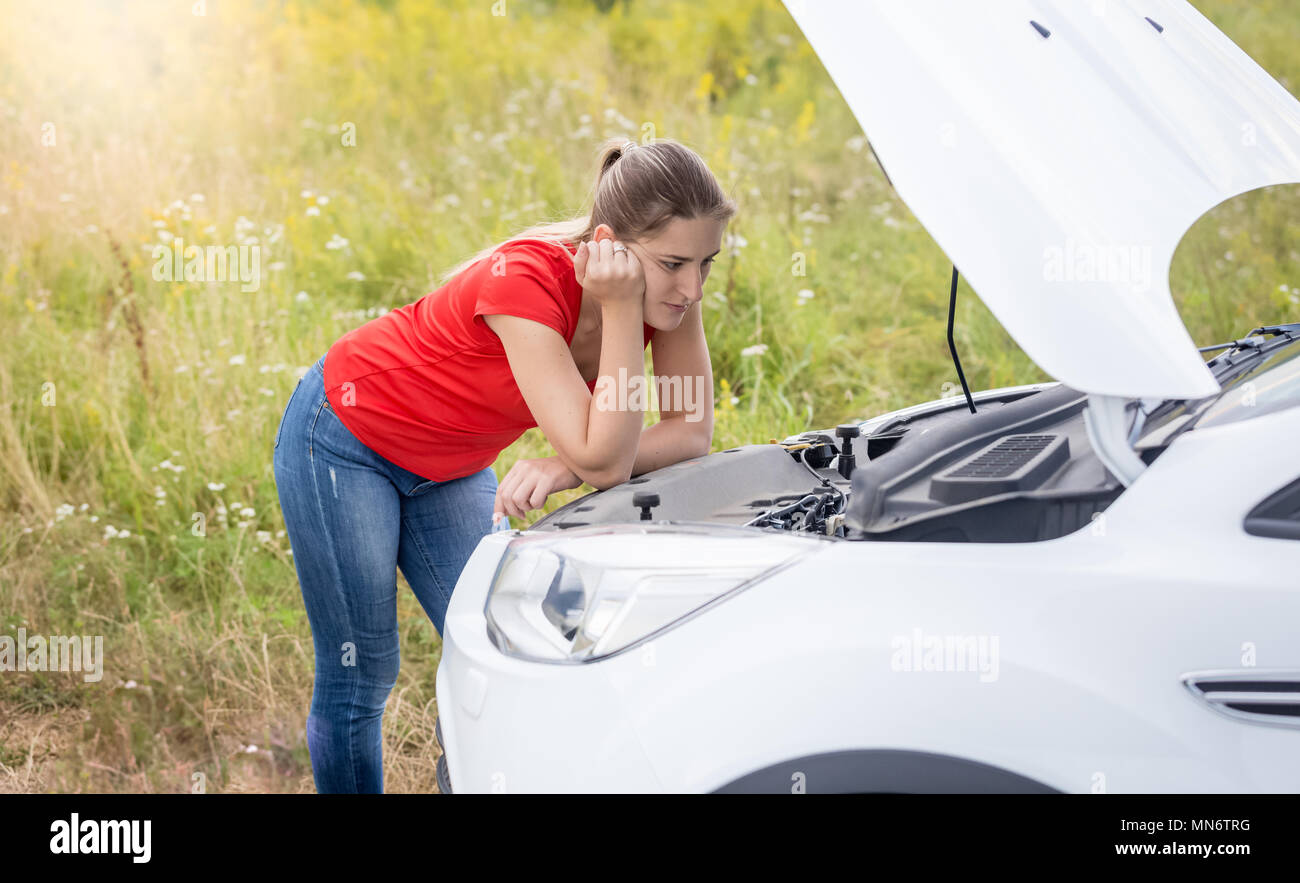Woman driving car looking upset hi-res stock photography and images - Alamy