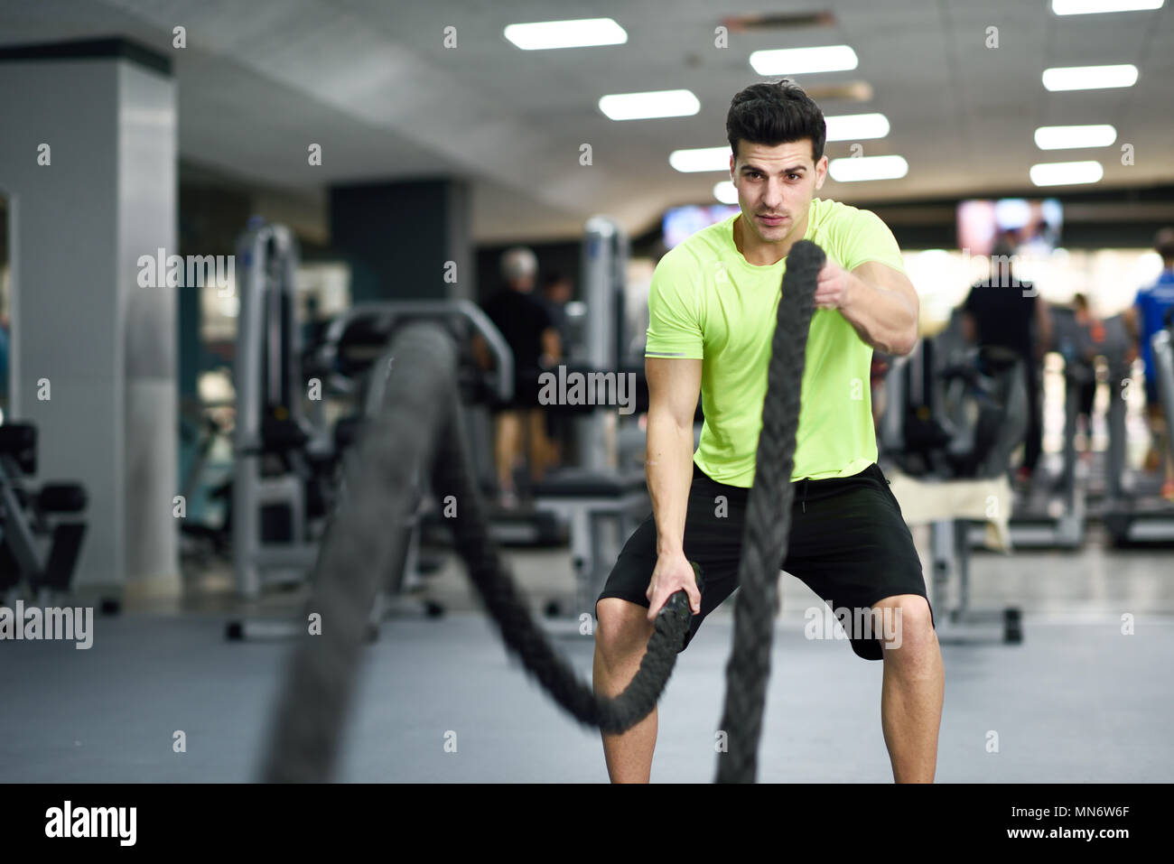 Exercising battle ropes person in hi-res stock photography and images ...