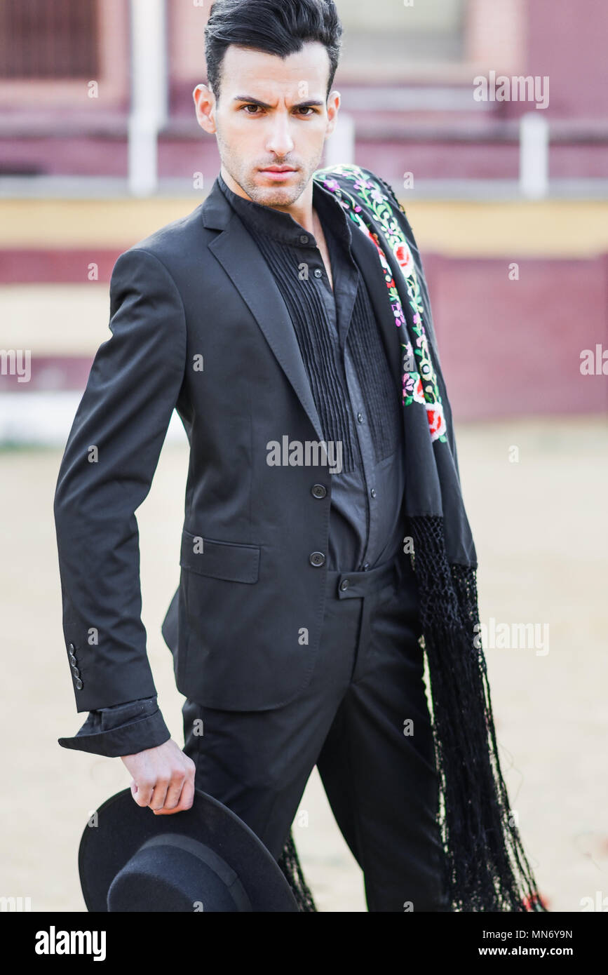 Portrait of a handsome man, model of fashion, wearing spanish clothes ...